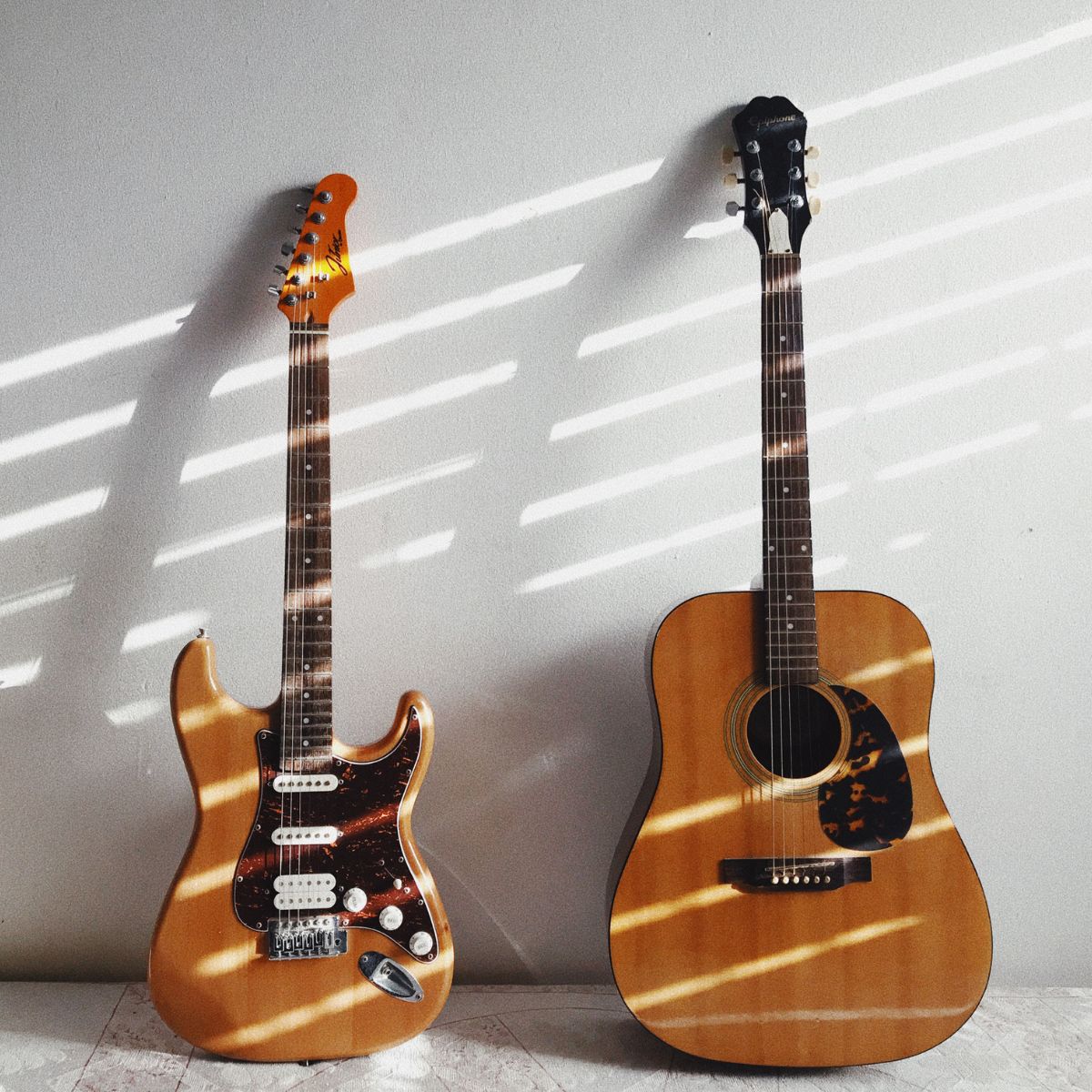 Electric vs. Acoustic Guitar: Which One Should You Learn? | Melodica ...